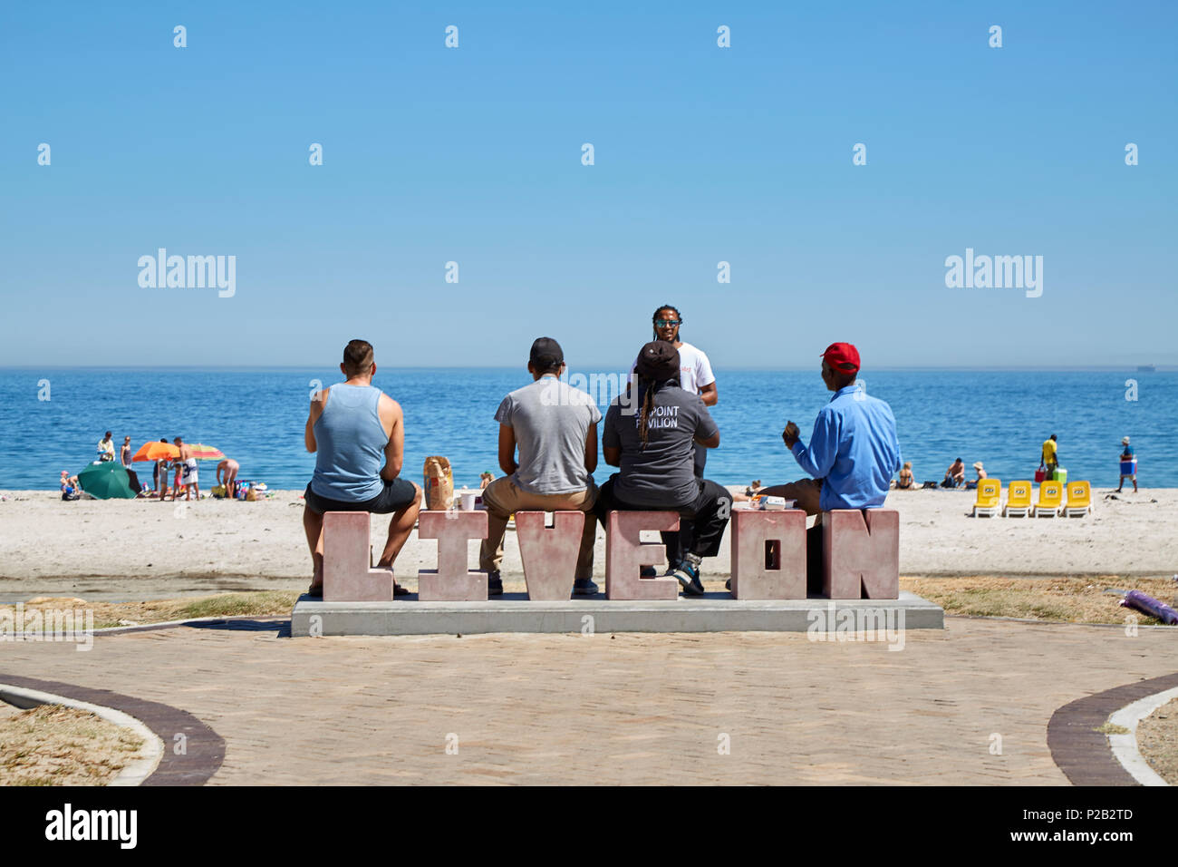 Seated locals hi-res stock photography and images - Alamy