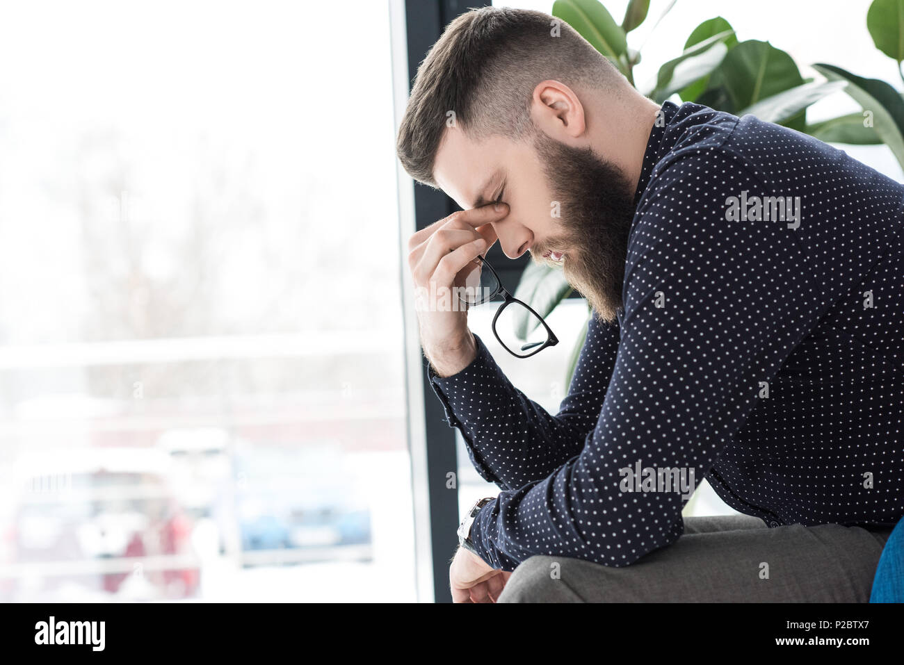 side view of tired man with eyeglasses Stock Photo - Alamy