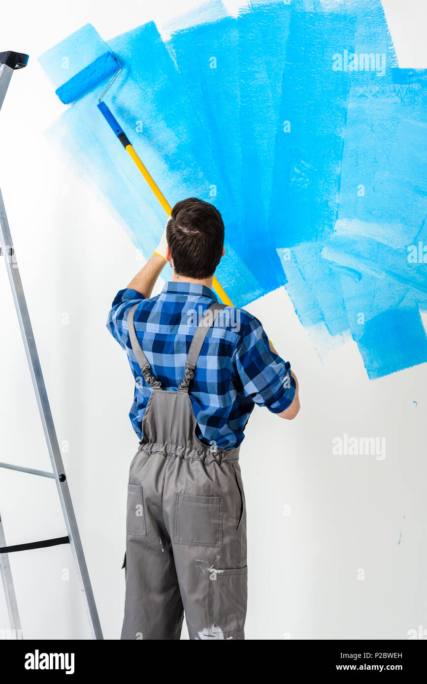 Someone Painting A Wall