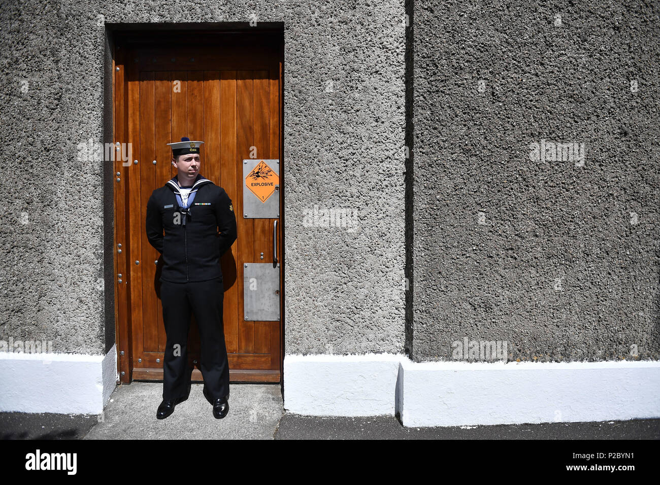A sailor stands guard as the Prince of Wales visits Cork Naval Base as ...