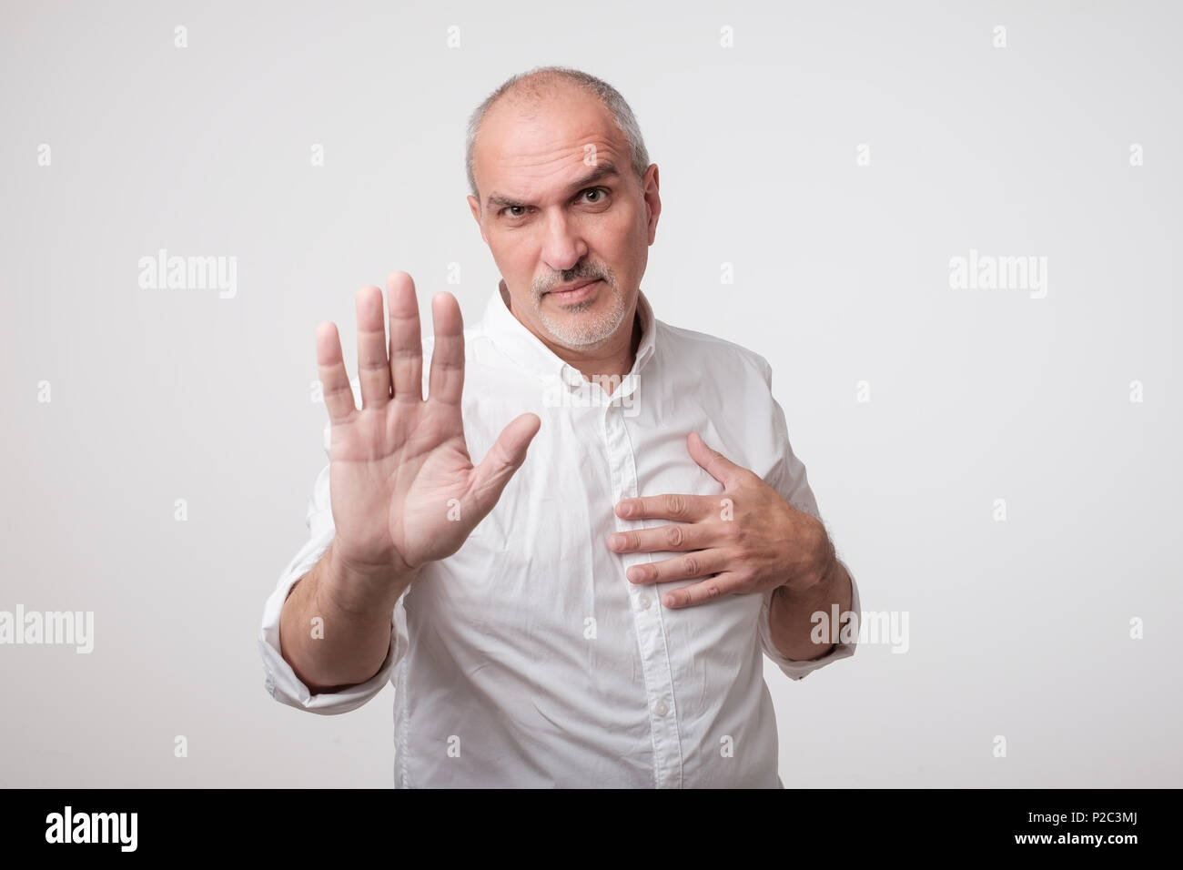 Businessman with stop hand up hi-res stock photography and images - Alamy