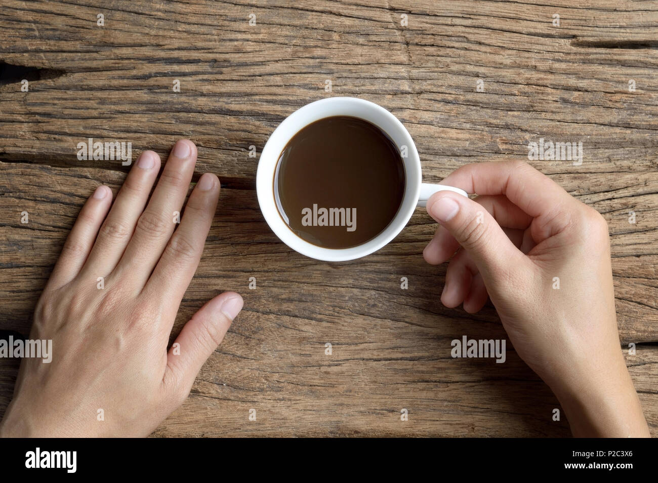 Top view hand cup black hi-res stock photography and images - Alamy