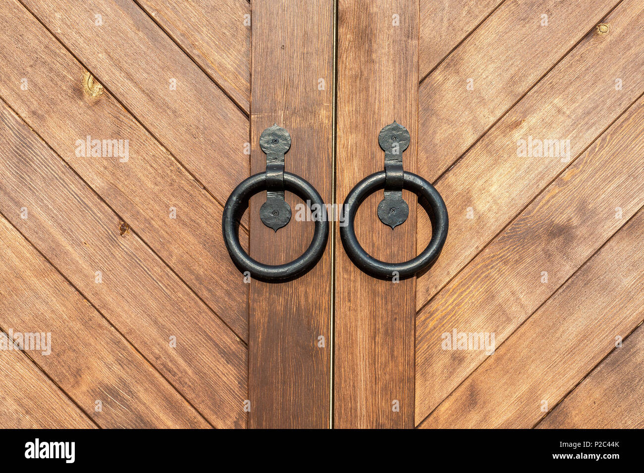 Traditional russian massive wooden gate with metal knobs Stock Photo ...