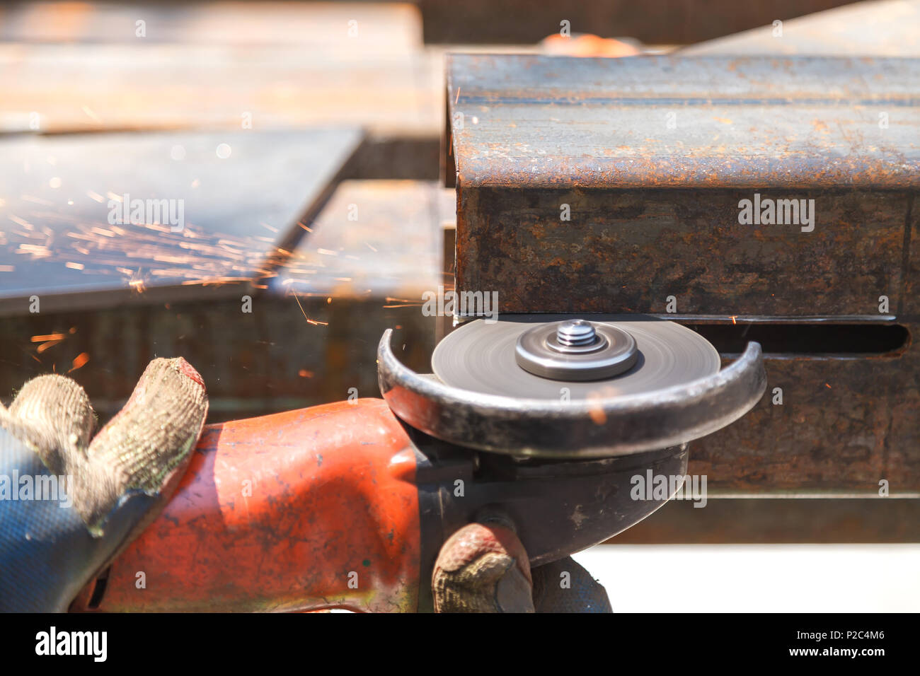 Cutting steel heavy industry by electric flex Stock Photo - Alamy
