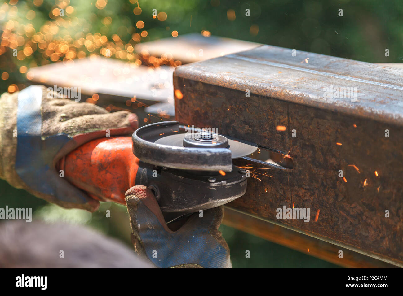 Cutting steel heavy industry by electric flex Stock Photo - Alamy