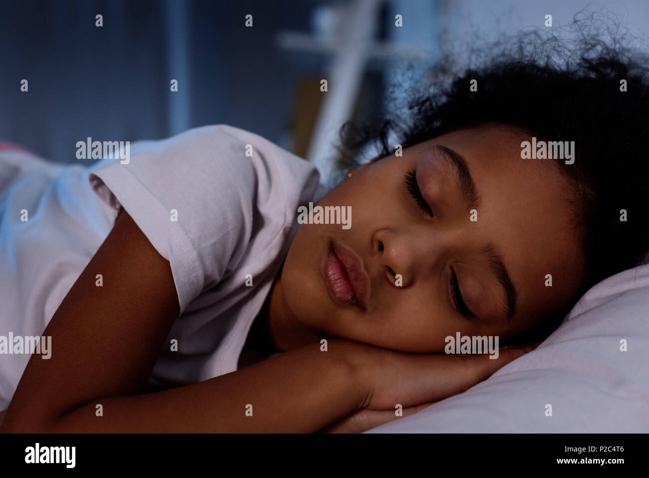 African american child sleeping alone hi-res stock photography and ...