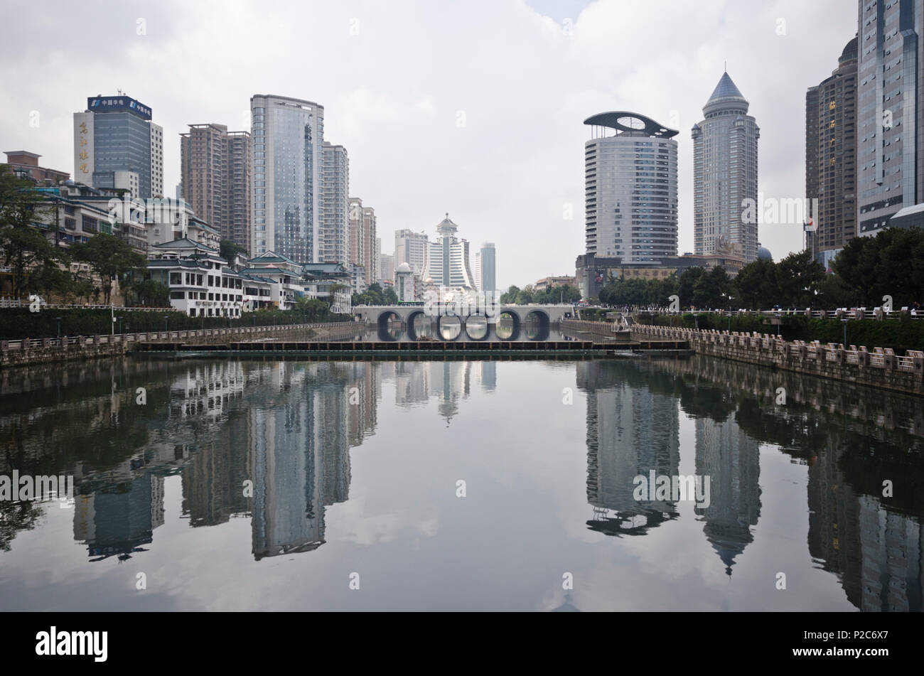 Modern buildings and the river Nanming in Guiyang, capital of the ...