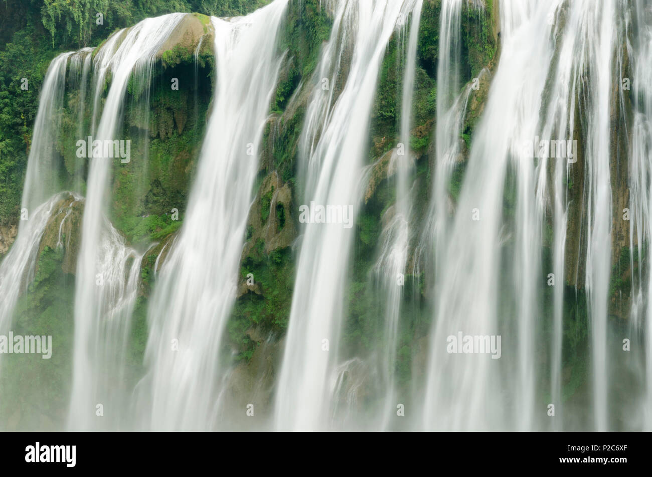 The Huangguoshu waterfall, almost 75 meters high and 100 meters wide ...