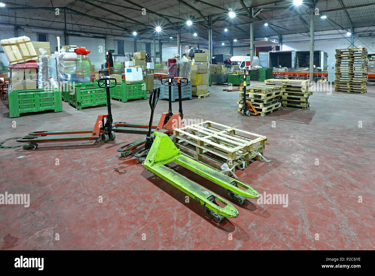 Manual Pallet Jack Truck in Distribution Warehouse Stock Photo - Alamy