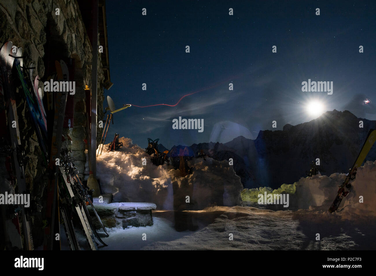 At night some guests of the Cabane des Aiguilles Rouges are moving ...