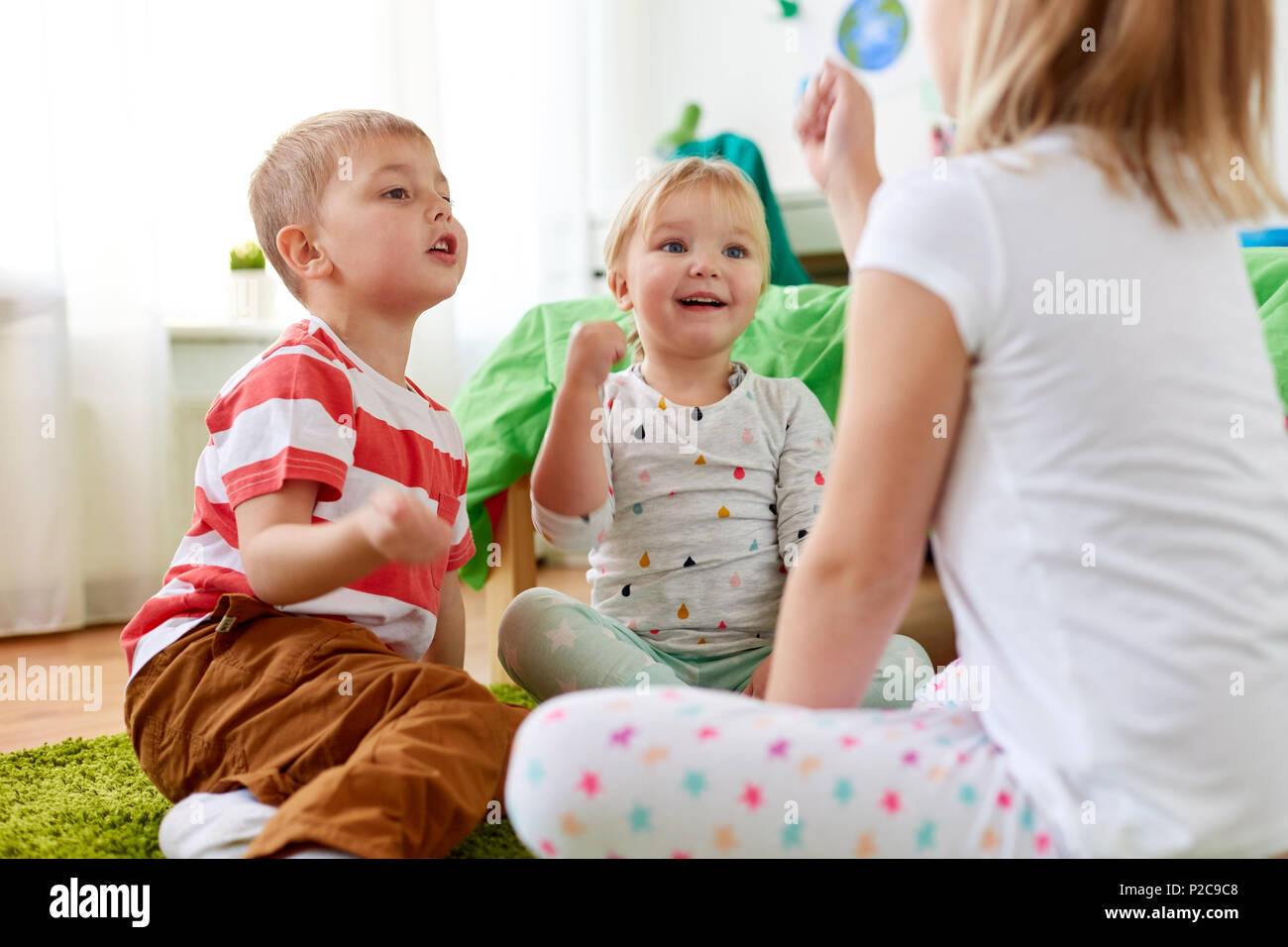 kids playing rock-paper-scissors game at home Stock Photo - Alamy