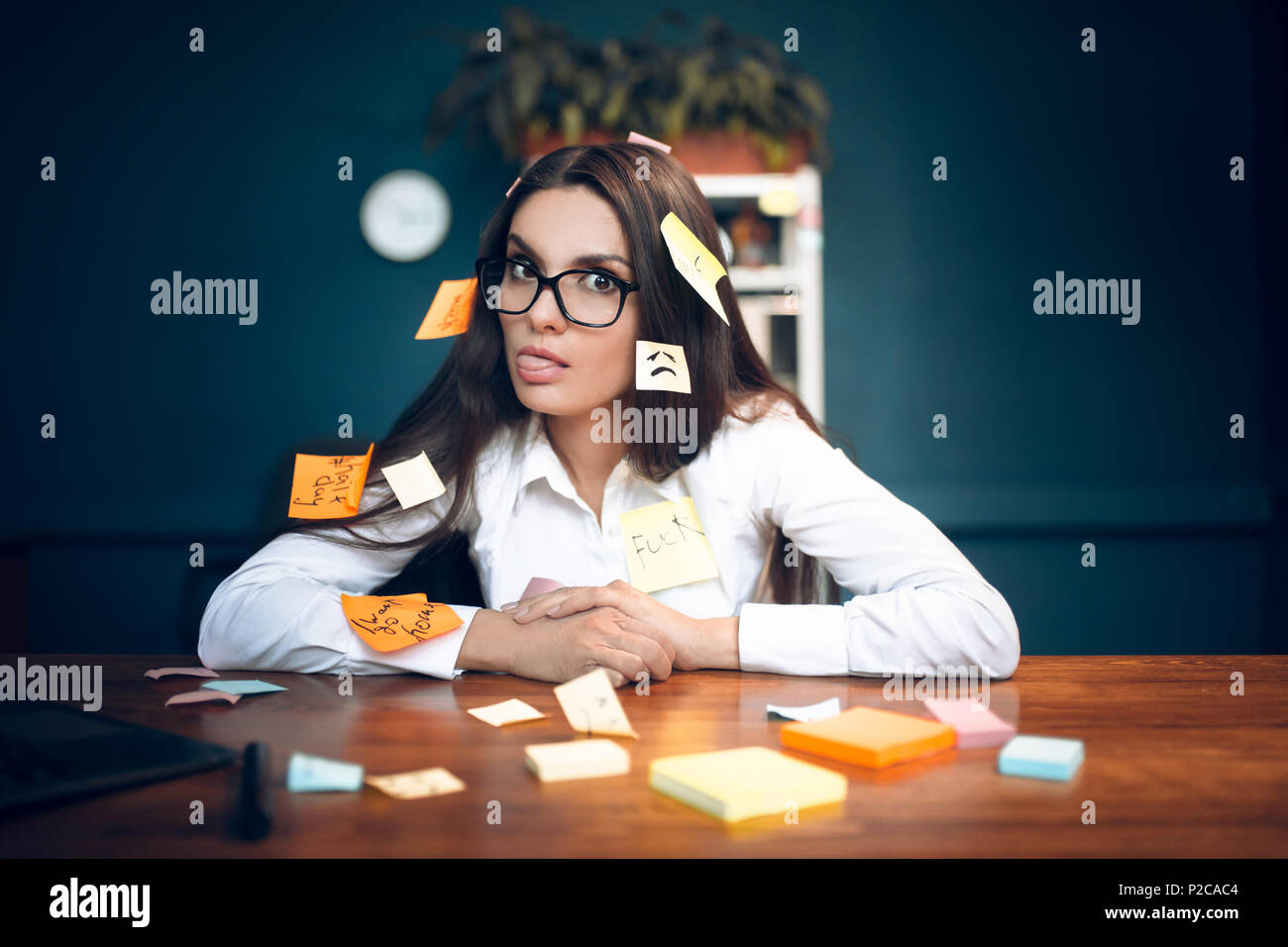 Business woman with sticky notes all over her Stock Photo - Alamy