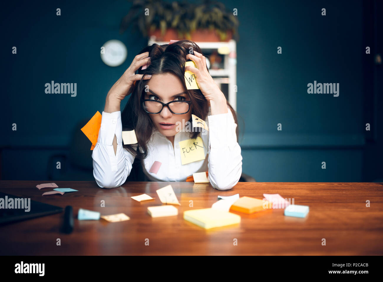 Business woman with sticky notes all over her Stock Photo - Alamy
