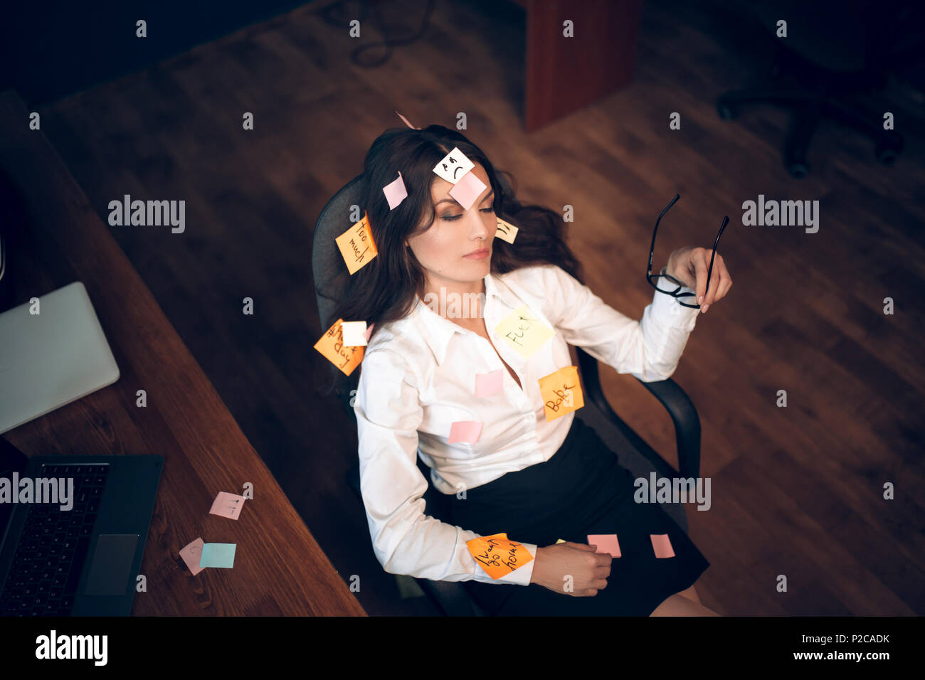 Business woman with sticky notes all over her Stock Photo - Alamy