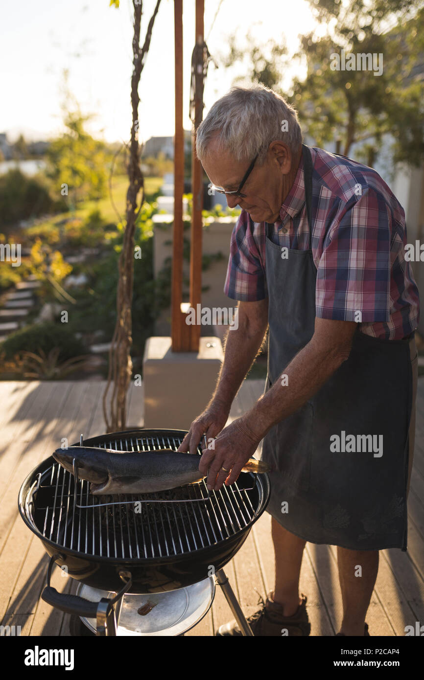 Man eating fish hi-res stock photography and images - Alamy