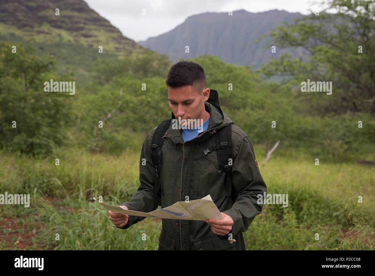 Man looking at map hi-res stock photography and images - Alamy