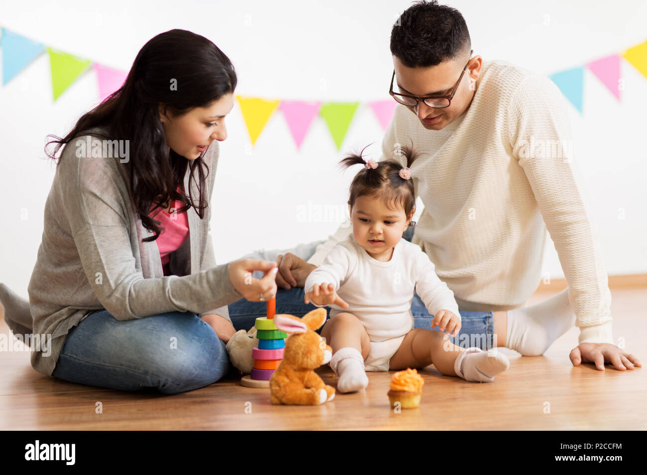 Baby parents toys hi-res stock photography and images - Alamy