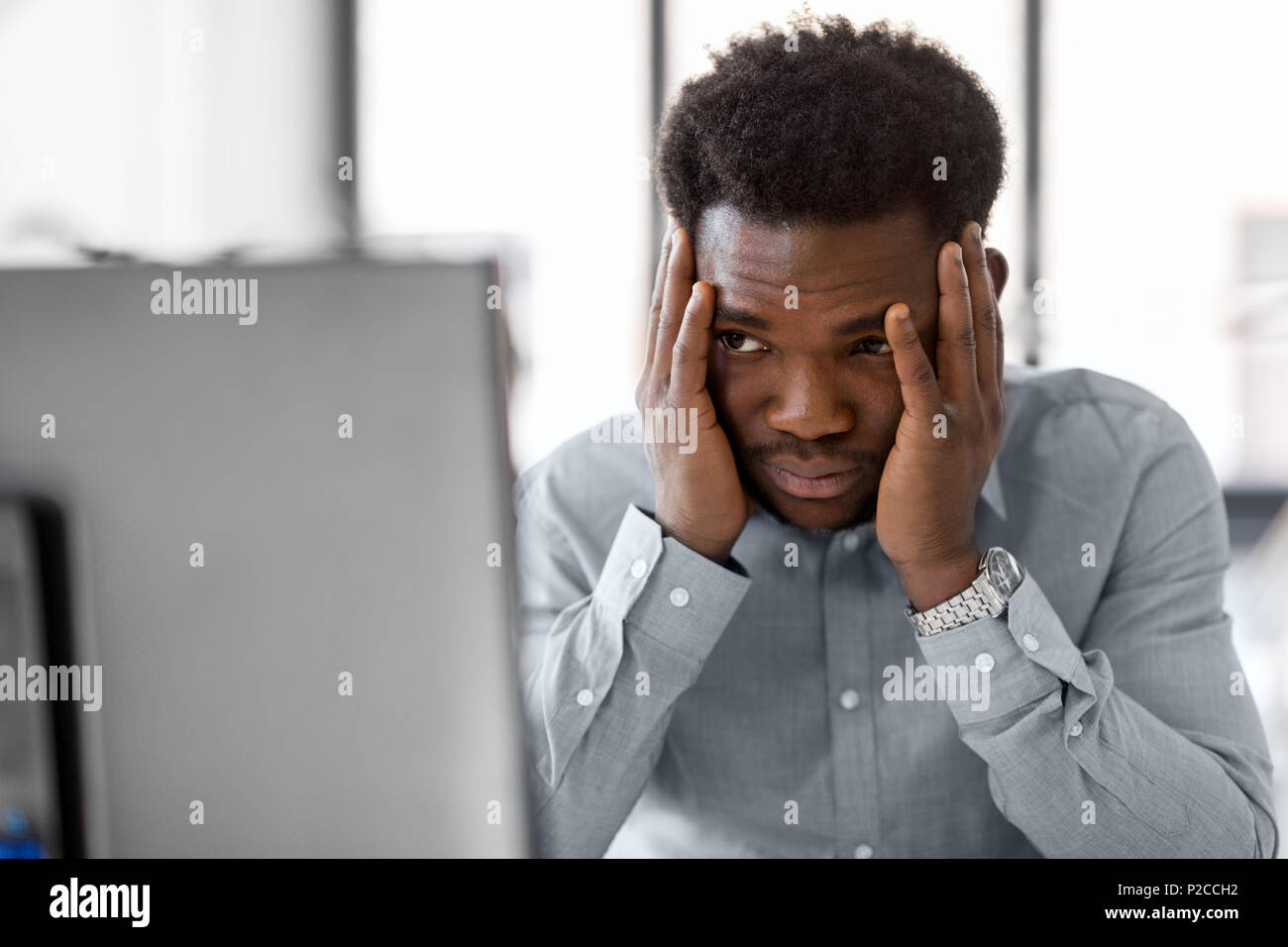 stressed businessman with computer at office Stock Photo - Alamy