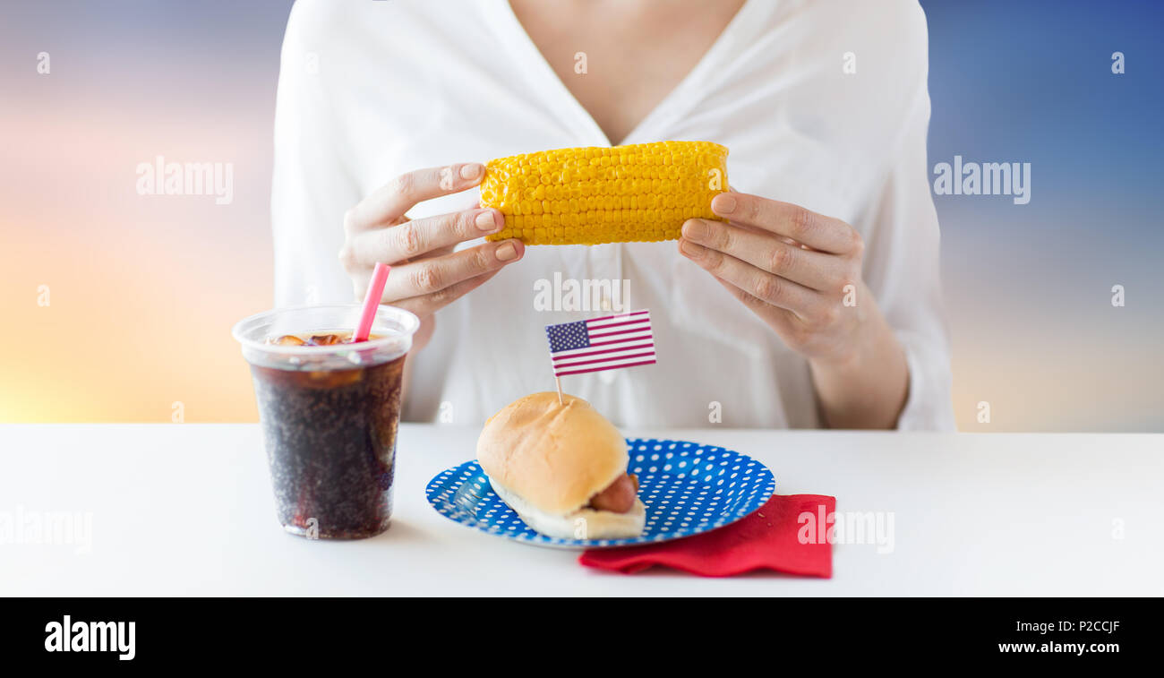 Woman eating corn dog hi-res stock photography and images - Alamy