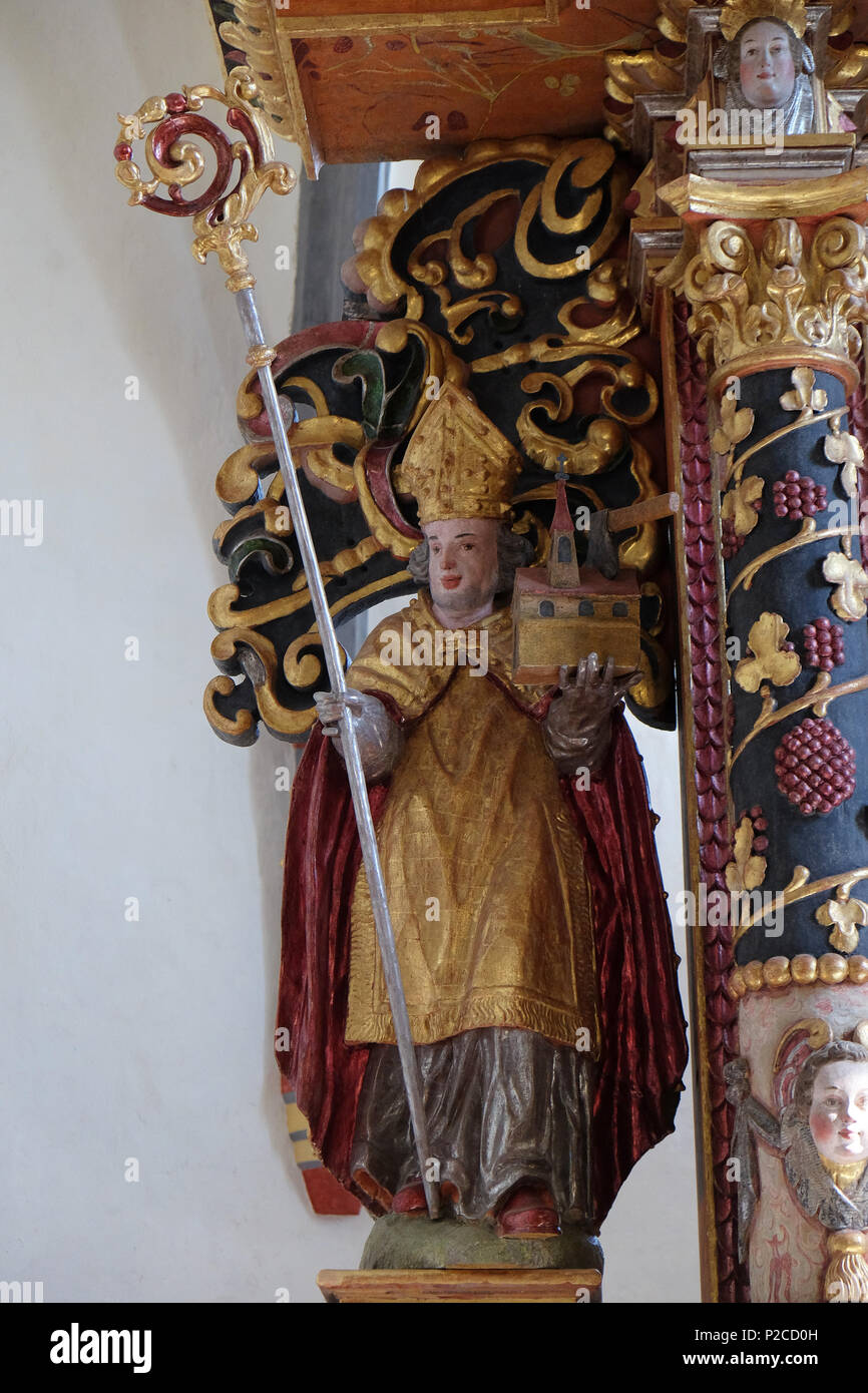 Saint Ambrose statue on the main altar in the chapel of St. Wolfgang in ...