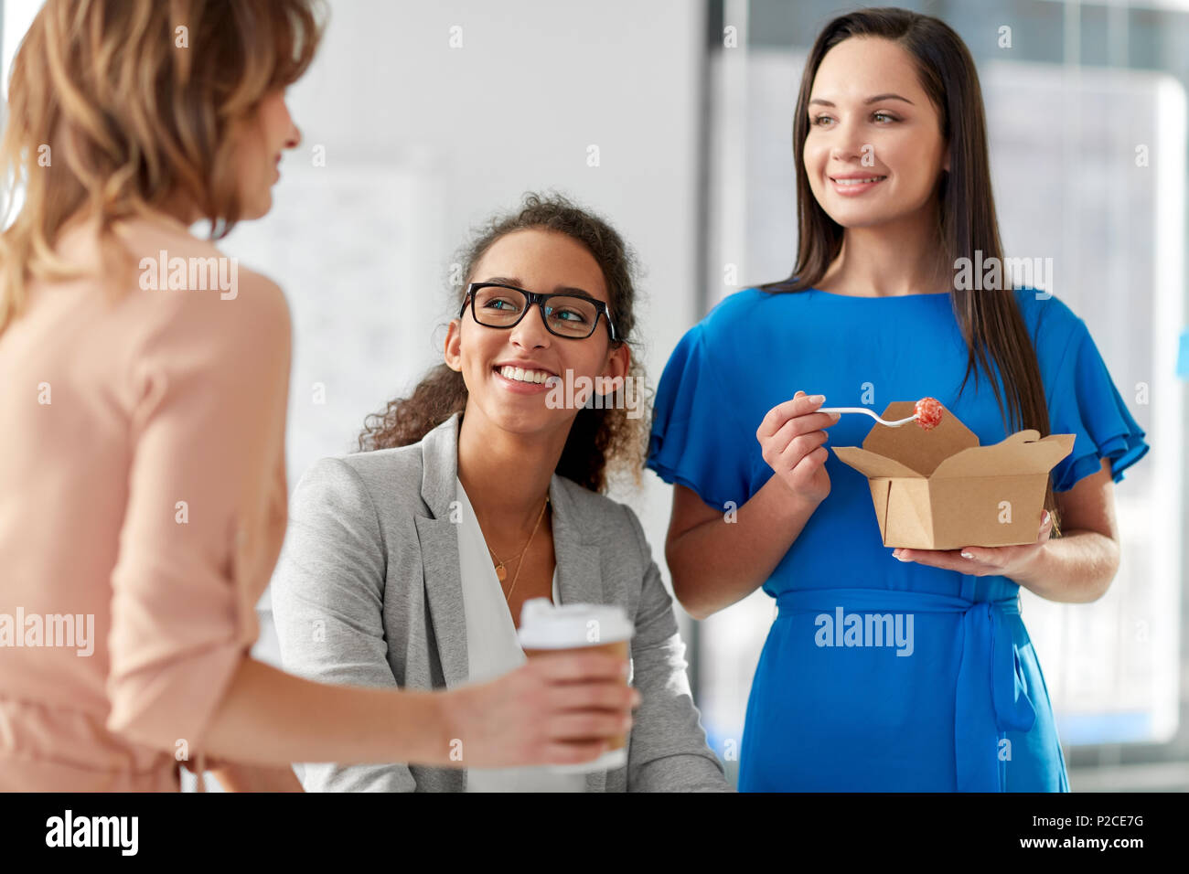 Woman eating take out food hi-res stock photography and images - Alamy