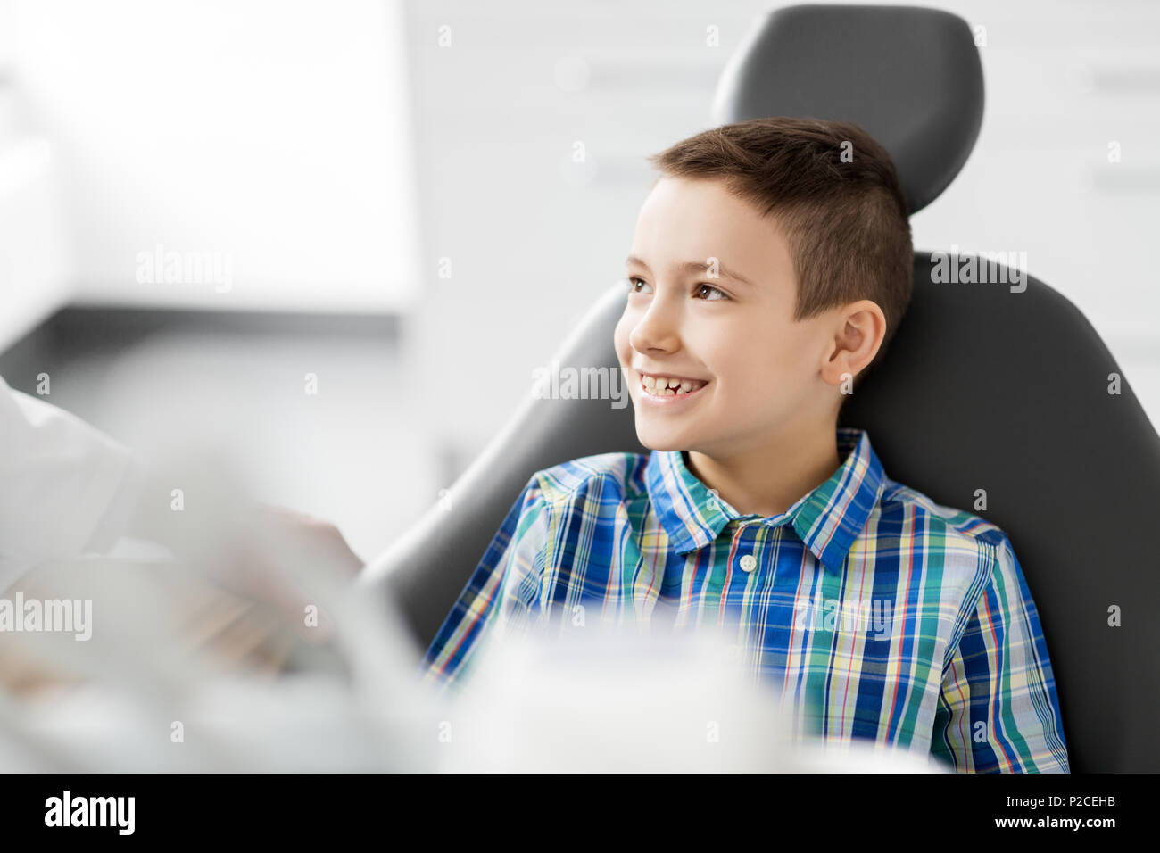 happy smiling kid patient at dental clinic Stock Photo - Alamy
