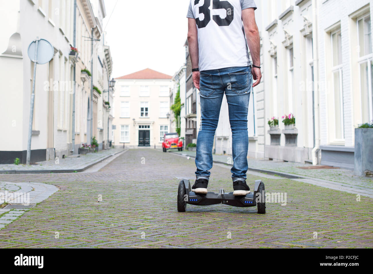 Modern technology, a man is riding on a blackboard. Close Up of Dual ...