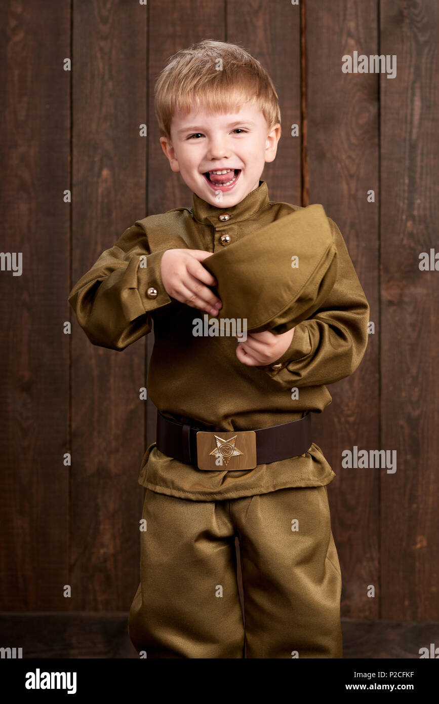 children are dressed as soldier in retro military uniforms Stock Photo ...