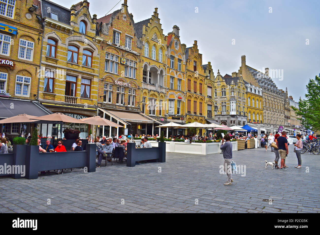Attractive square with restaurants and old buildings hi-res stock ...