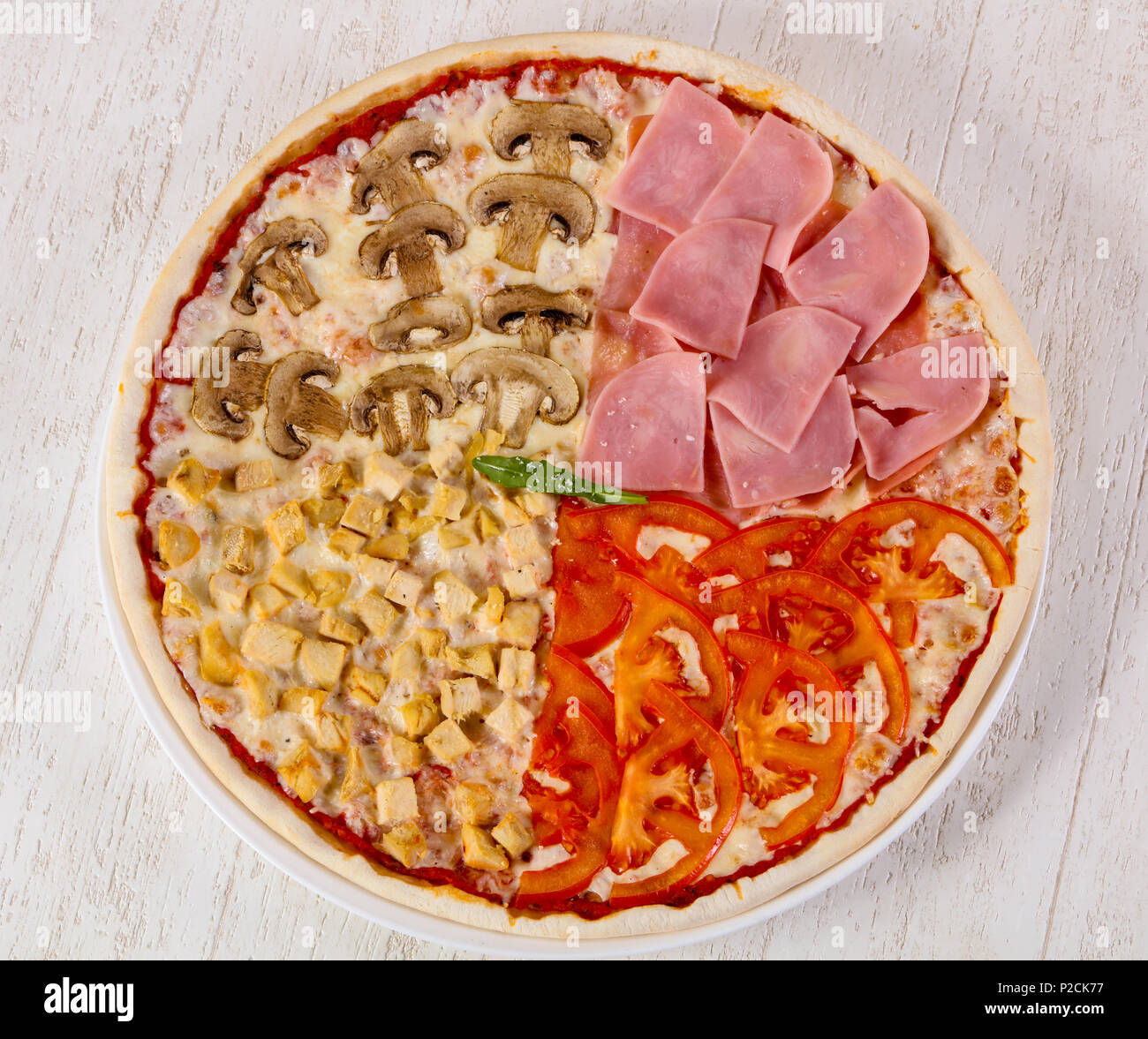 Pizza assortment mix with ham and mushrooms Stock Photo - Alamy