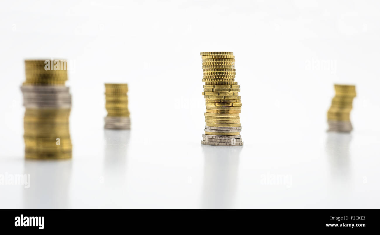 Stack of coins, four of rows isolated on white background. Growing and ...