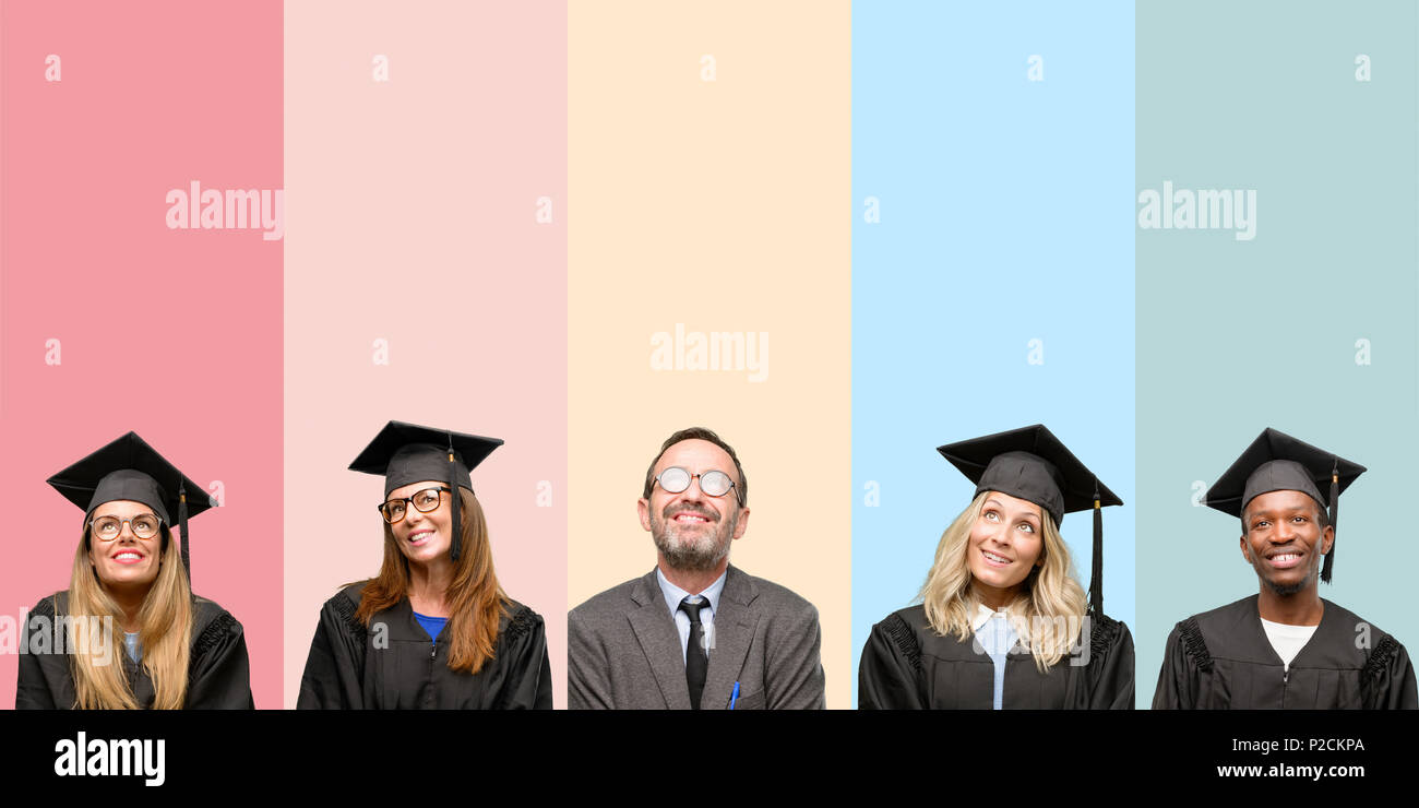 Senior teacher with his graduate students thinking and looking up ...