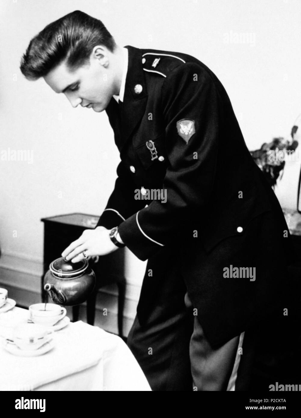 The American singer Elvis Presley in a hotel room in Paris on leave ...