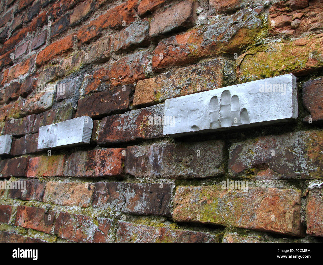 61 Symbolical handprints of postmans on the wall, where SS arrested ...