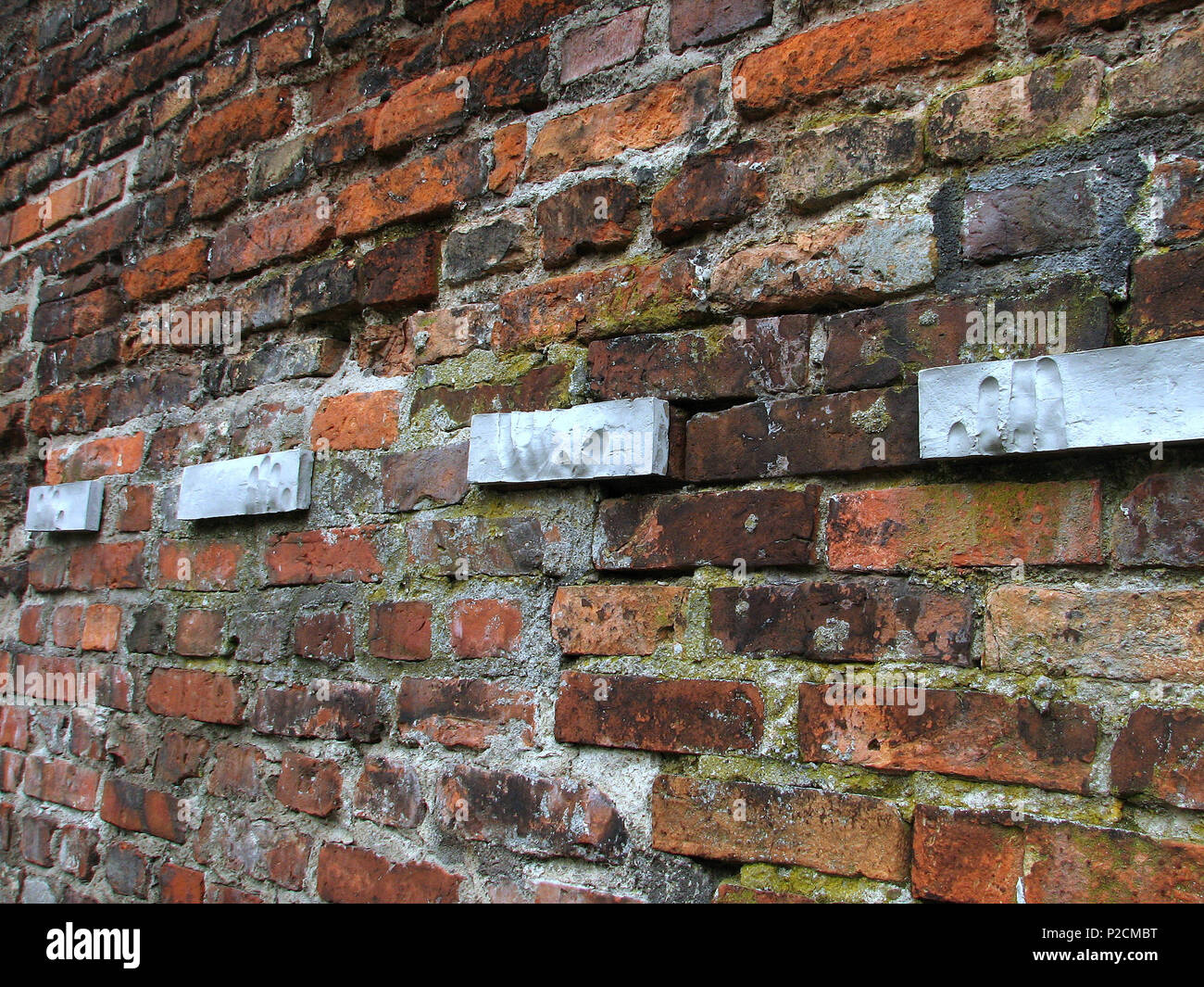 61 Symbolical handprints of postmans on the wall, where SS arrested ...