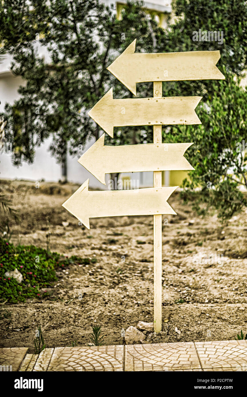 direction indicator. wooden signpost. Directions four signs to one ...