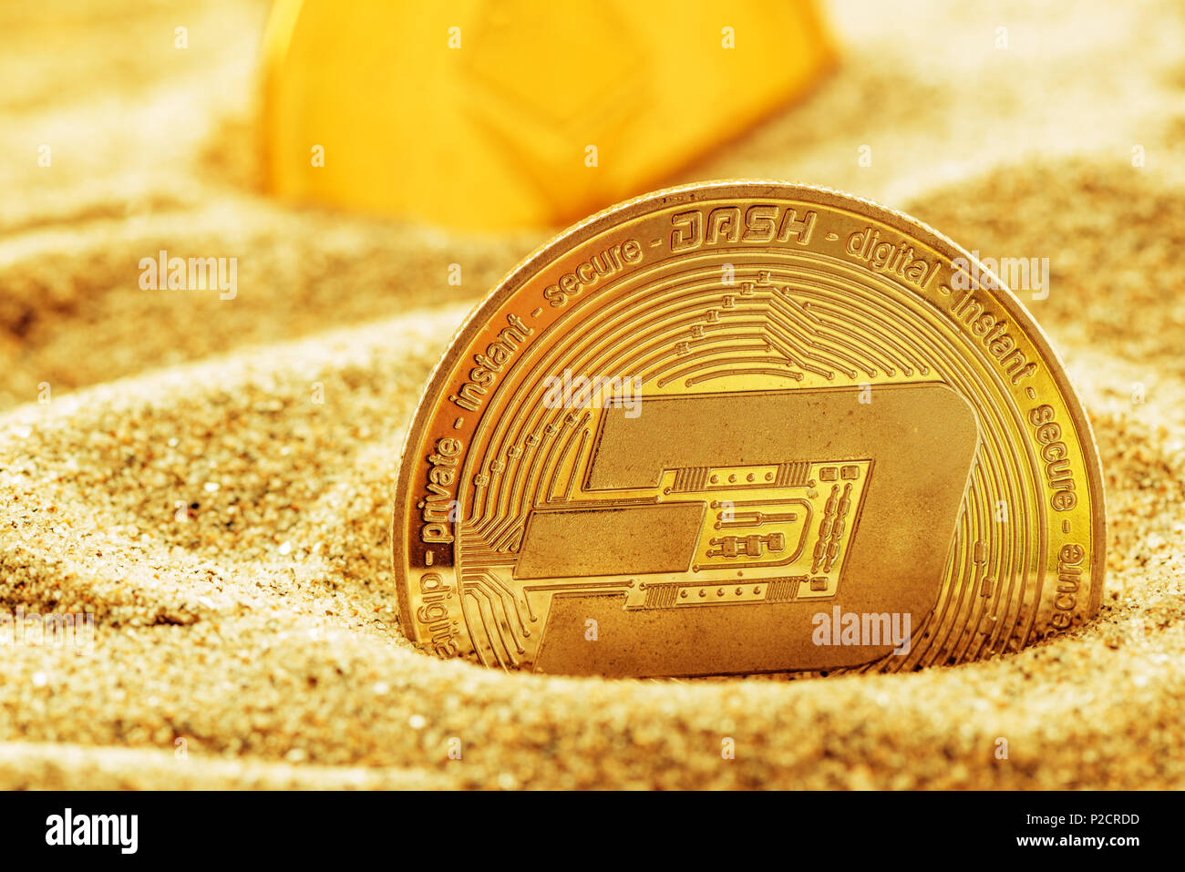Coin in sand hi-res stock photography and images - Alamy