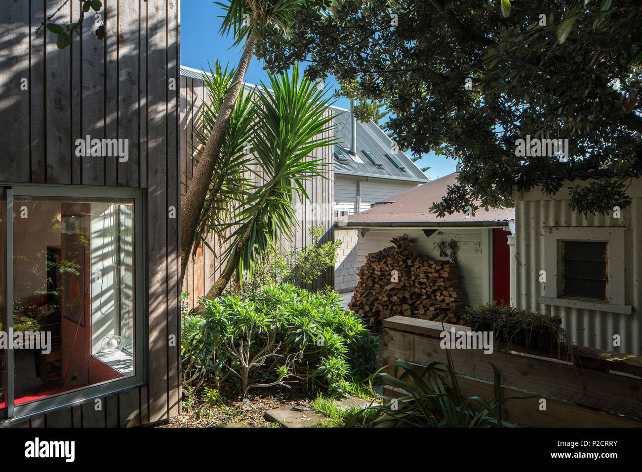 View from Garden of bach / beach house with new building on left and ...