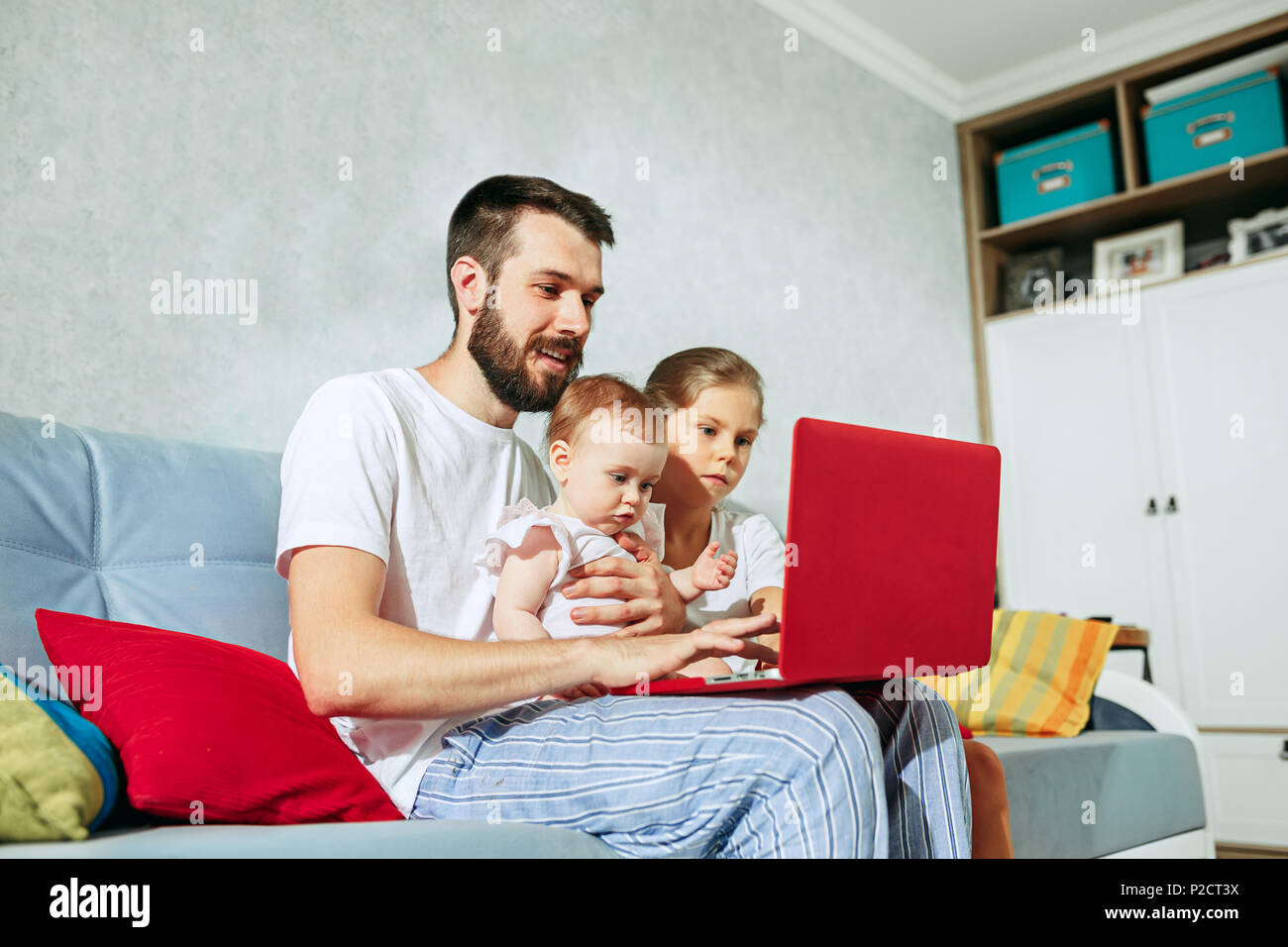father and his daughters at home Stock Photo - Alamy