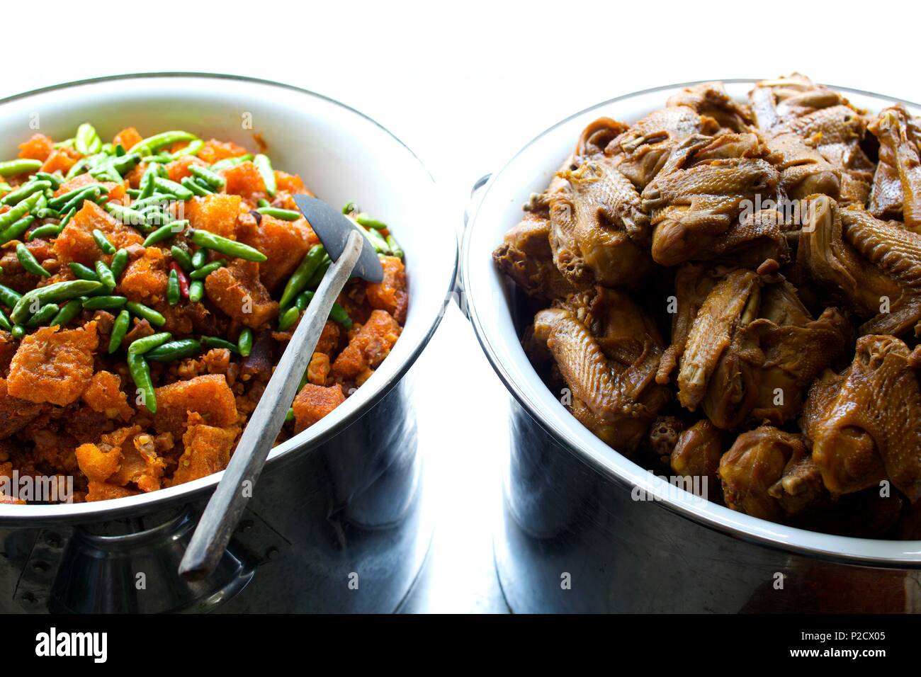 Indonesia, Java, Central Java, Yogyakarta, showcase of dish cooked in a ...