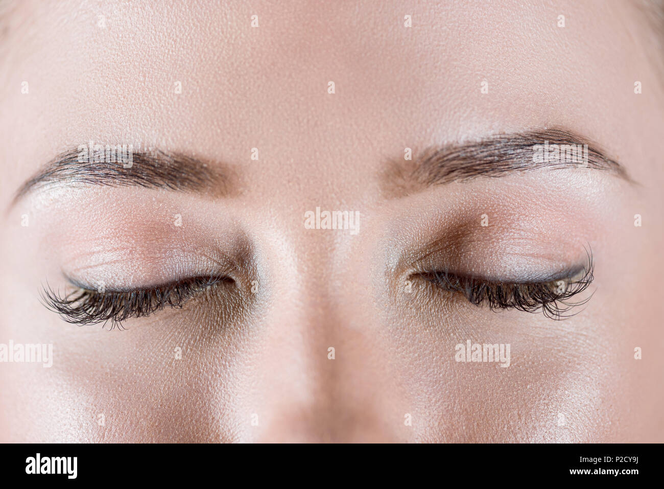 Close-up view of closed female eyes with long eyelashes Stock Photo - Alamy