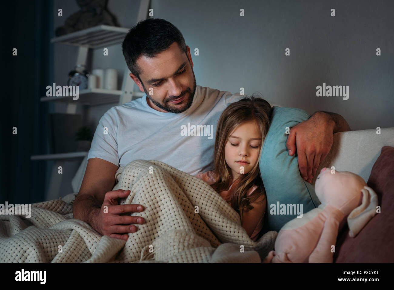 portrait of father looking at innocent sleeping daughter Stock Photo - Alamy