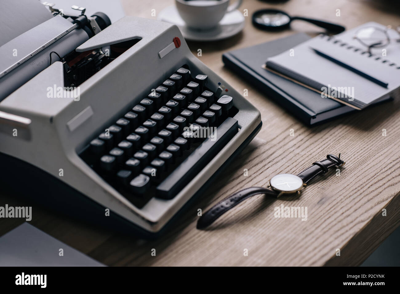 close-up shot of writer workplace with typewriter and watch Stock Photo ...