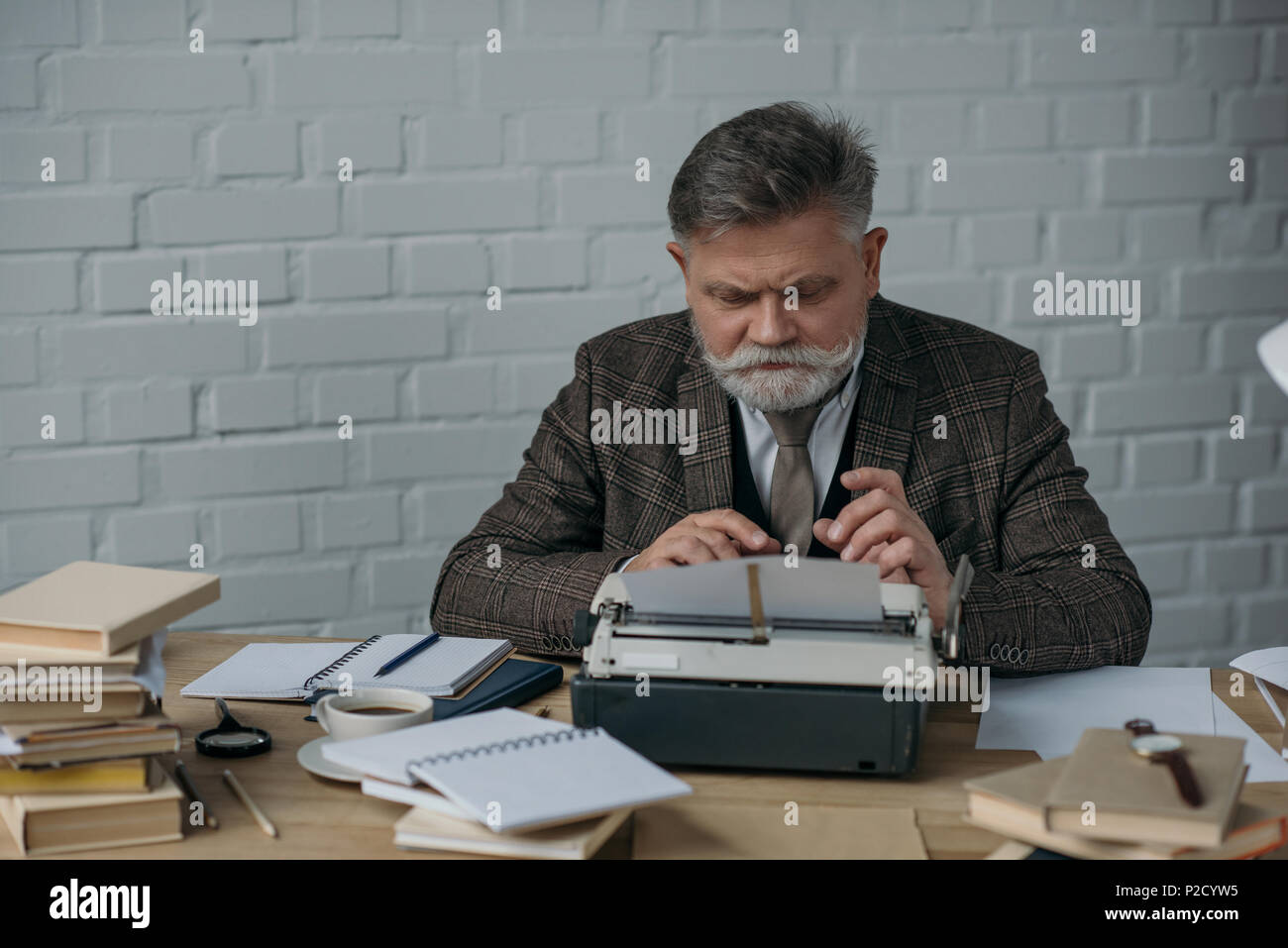 Man writing in vintage typewriter hi-res stock photography and images ...
