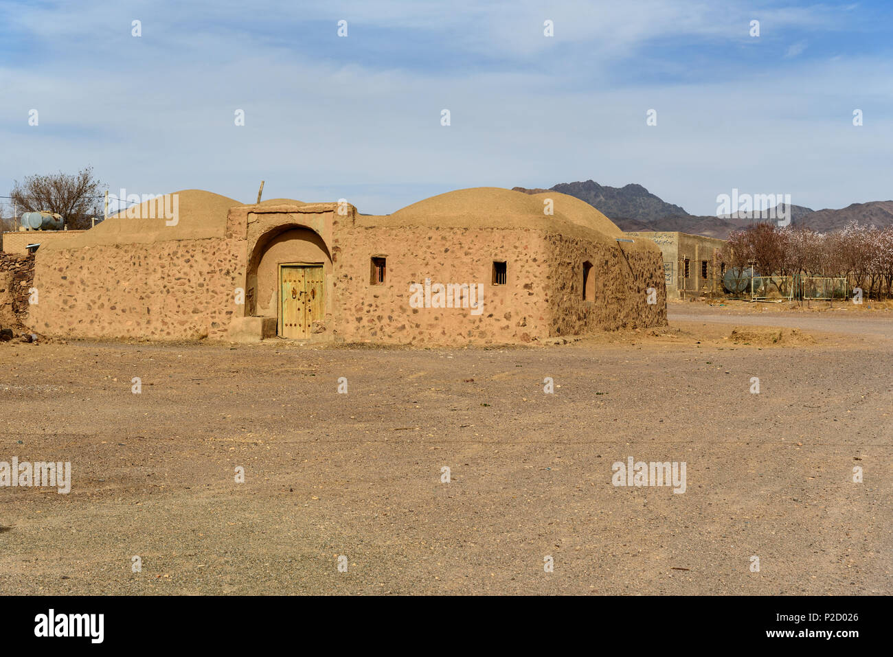 Old houses with dome roof. Traditional Iranian adobe village in Isfahan ...