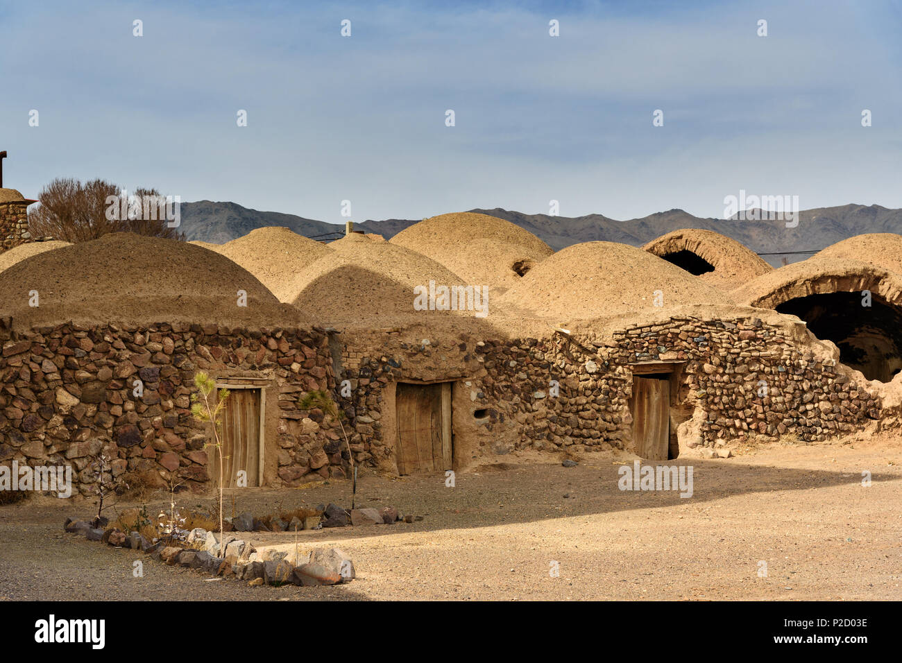 Old houses with dome roof. Traditional Iranian adobe village in Isfahan ...
