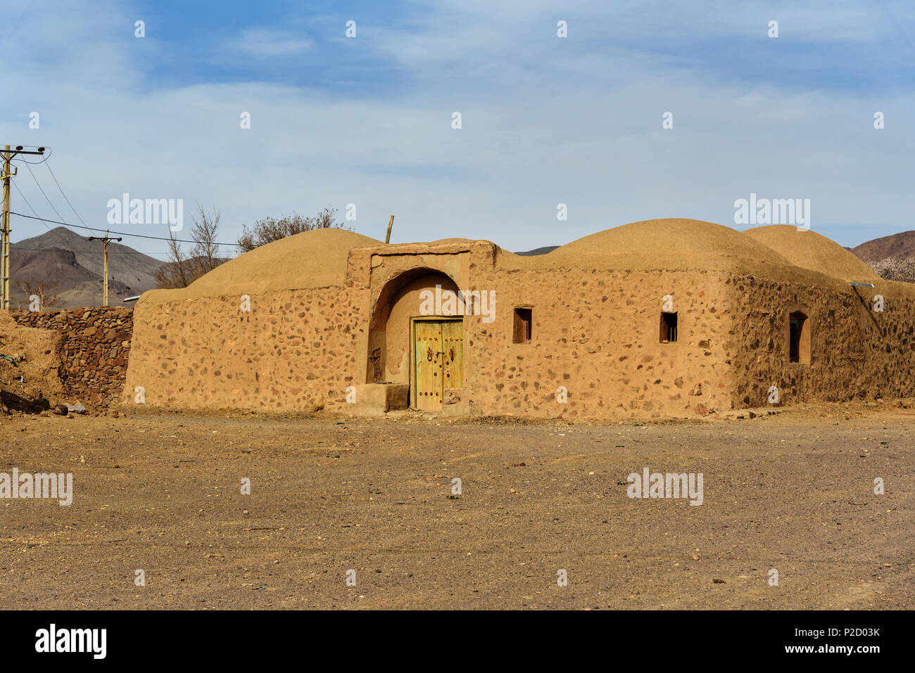 Old houses with dome roof. Traditional Iranian adobe village in Isfahan ...