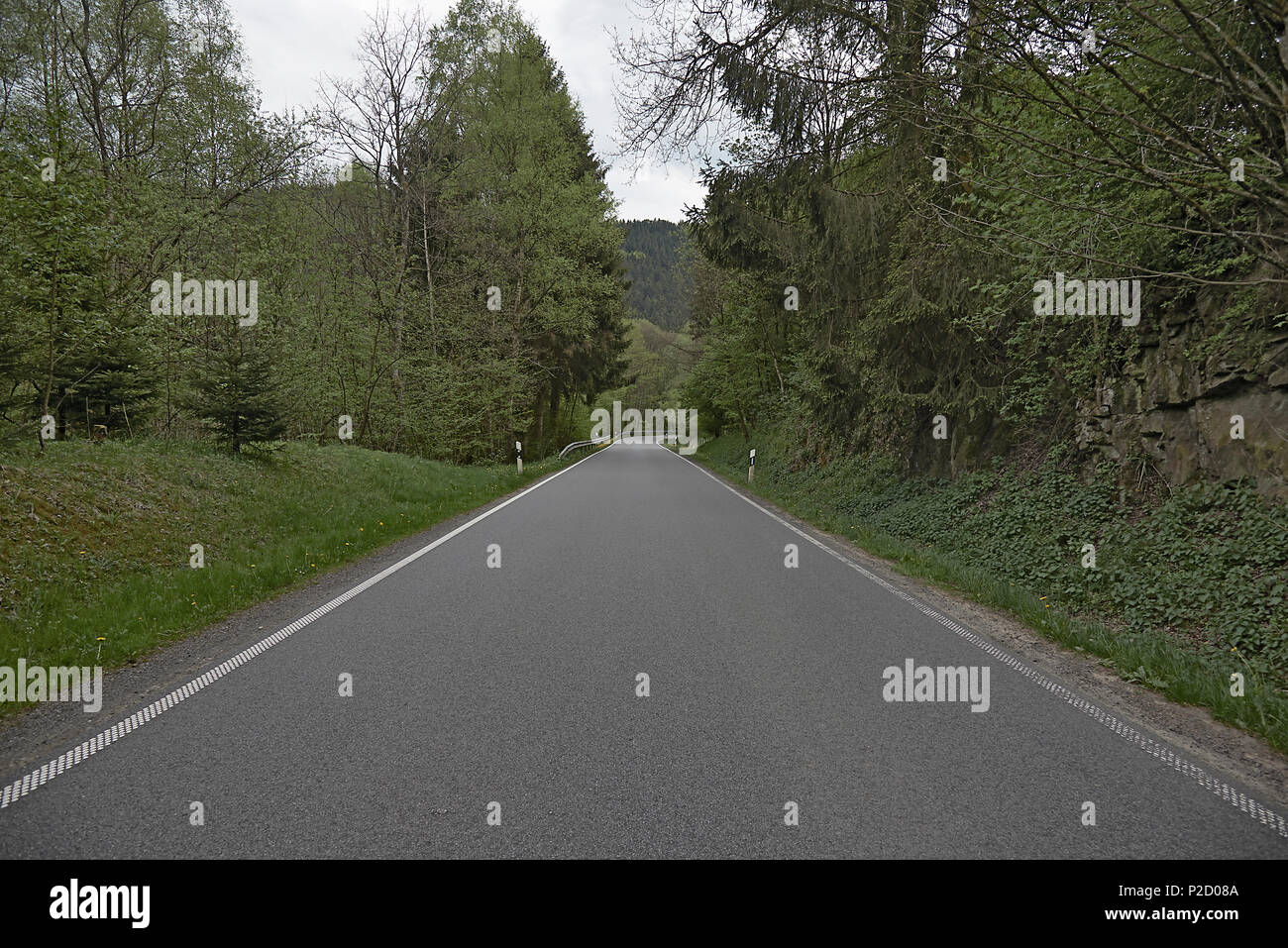 Long road side angle hi-res stock photography and images - Alamy