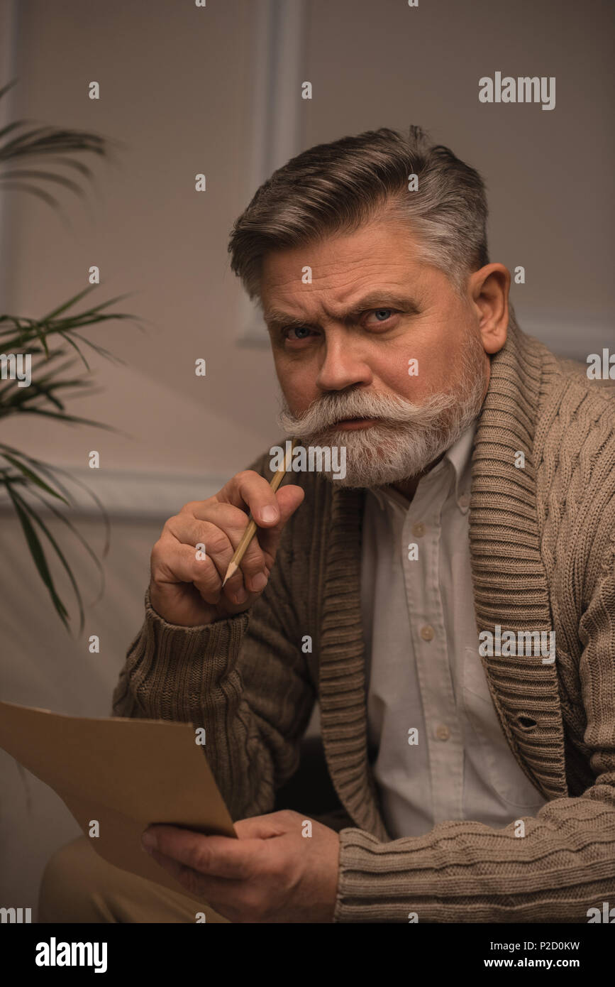 Old man writing letter hi-res stock photography and images - Alamy