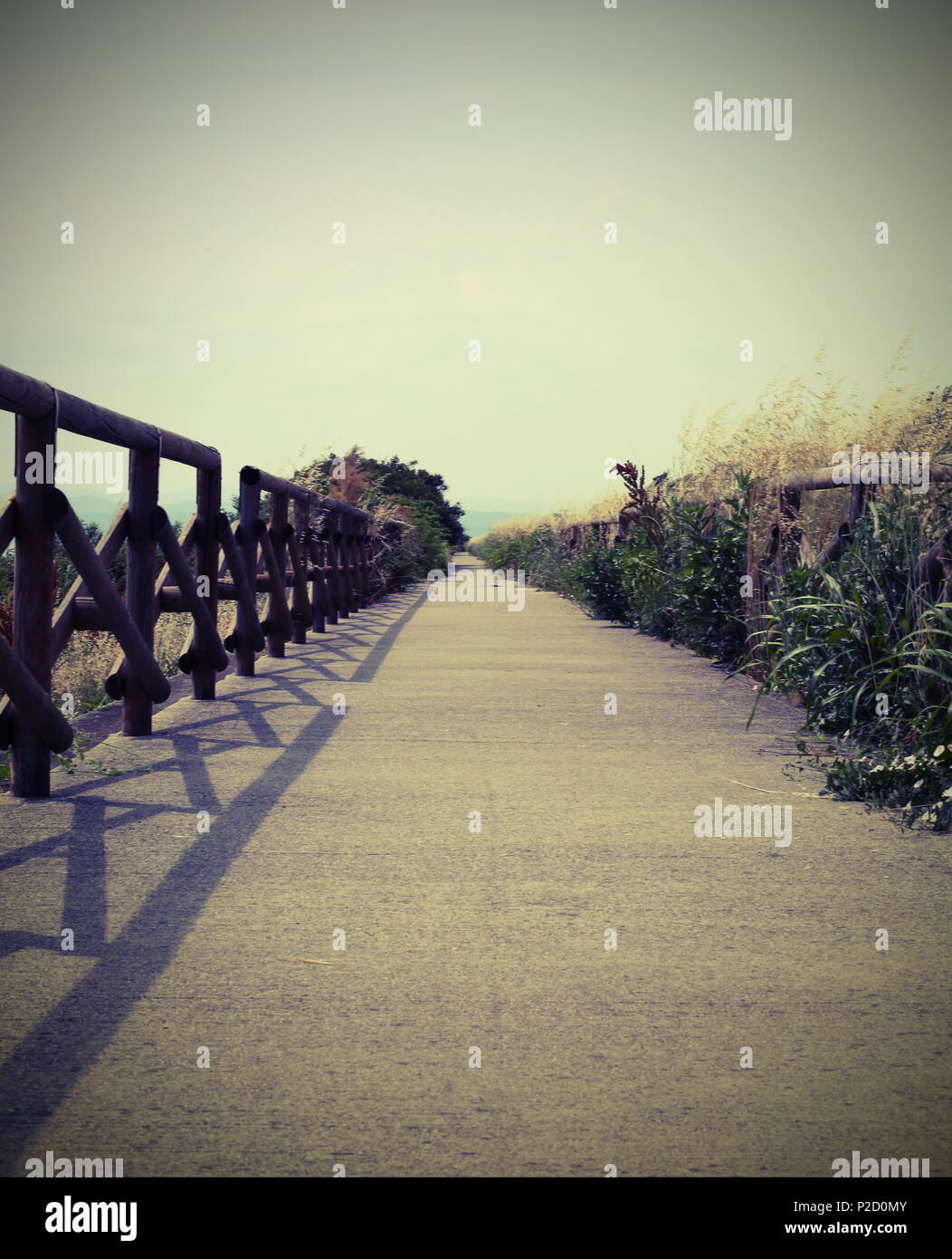 Long cycle path with antique effect and you can not see the end Stock ...